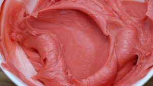 How to Make RED Buttercream - British Girl Bakes