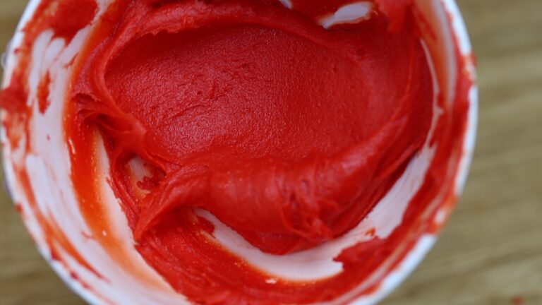 How to Make RED Buttercream - British Girl Bakes